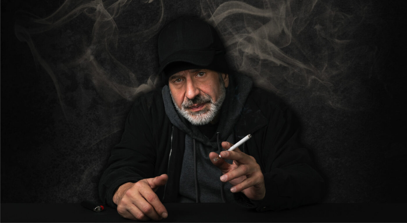 Dave Attell prepares to break hearts and rip darts at The Wilbur